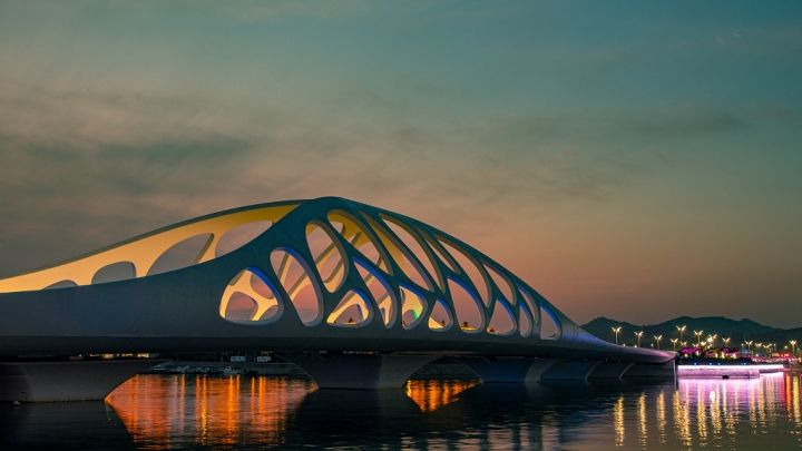 Qingdao Coral Bay Bridge in sunset - China Plus