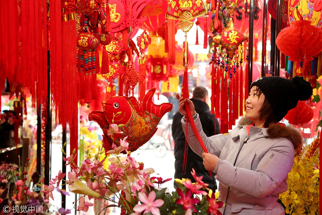 People across China busy shopping for coming Spring Festival - China Plus
