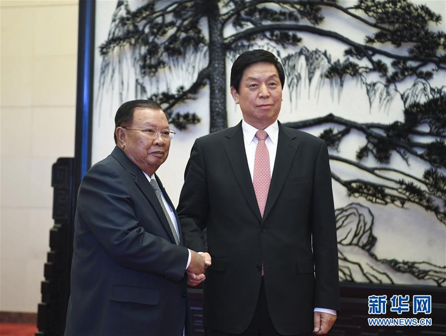 Chinese top legislator meets Lao president - China Plus